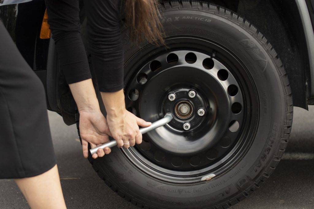 How to Change a Tire Using the Jack and Jill of All Tires
